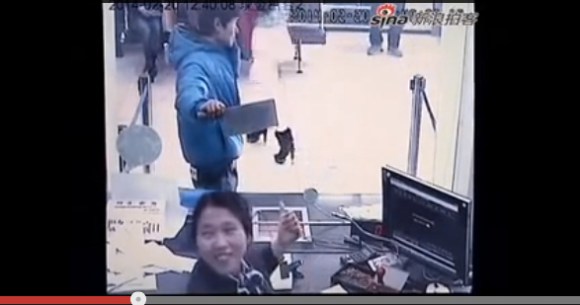 Chinese bank teller becomes internet sensation for belly laughing at ...