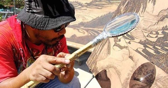 Sun + Magnifying glass = Art? One man’s unique “painting” style will ...