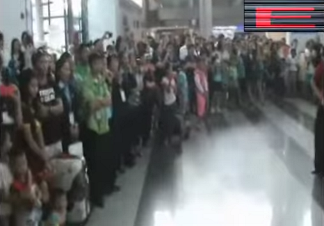 Flash mob at Manila airport brings holiday cheer to surprised ...