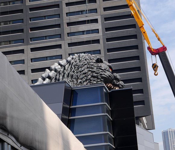 Godzilla appears in the Tokyo skyline atop new Shinjuku skyscraper ...