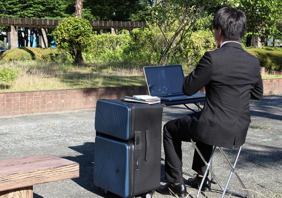 Rolling suitcase with built-in desk is perfect for mobile ...
