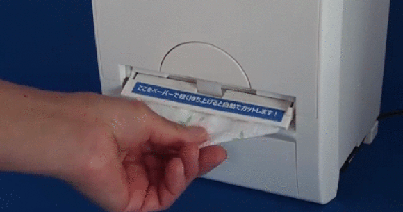 New Japanese toilet paper dispenser tears off sheets, folds the ends ...