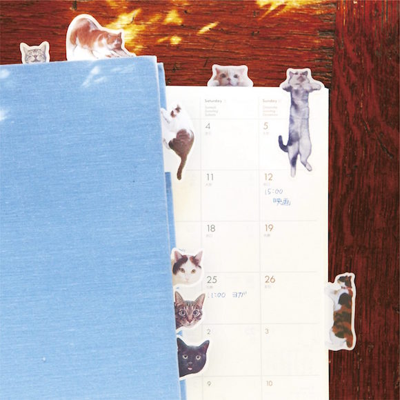 Cute adhesive cat tabs keep your pages marked with adorably playful ...