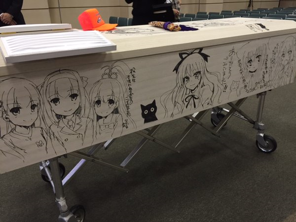 Japanese novelist goes out in anime-style in coffin illustrated with ...