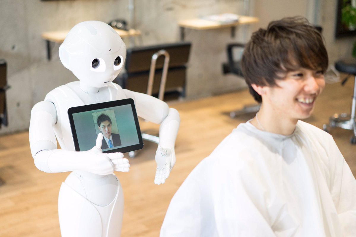 Pepper the robot suggests what haircut is best for you at Japanese ...