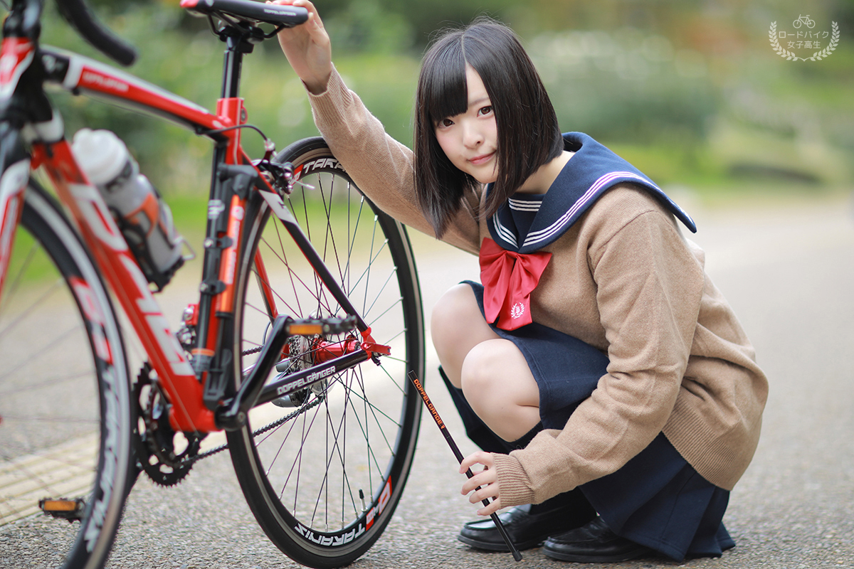Japanese cosplayer dresses as female high school student for new road ...