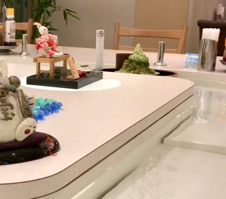 Move over revolving sushi – Japanese cafe floats desserts to you on a ...