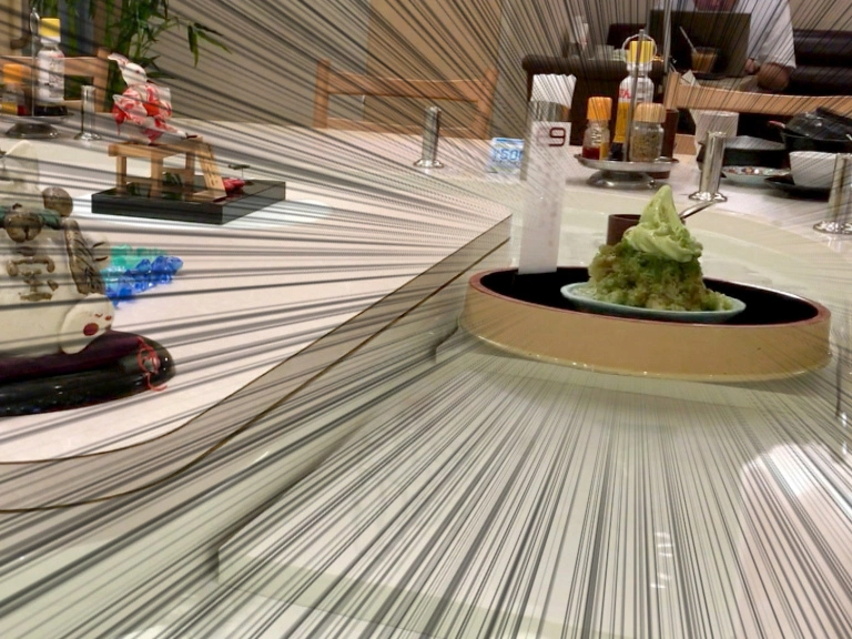 Move over revolving sushi – Japanese cafe floats desserts to you on a ...