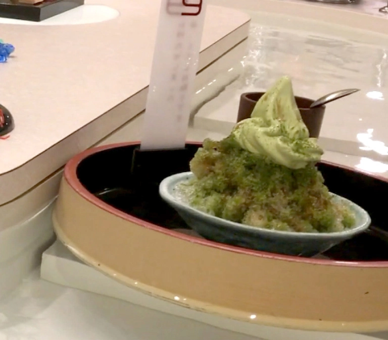 Move over revolving sushi – Japanese cafe floats desserts to you on a ...