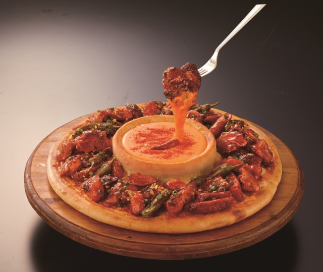 Japanese pizza chain makes headlines with weirdly wonderful fish-shaped ...