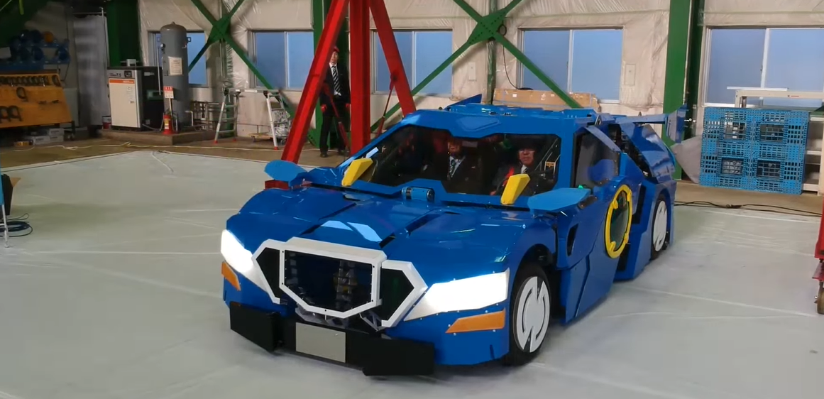 Japan now has a transforming giant robot/car that two full-sized adults ...