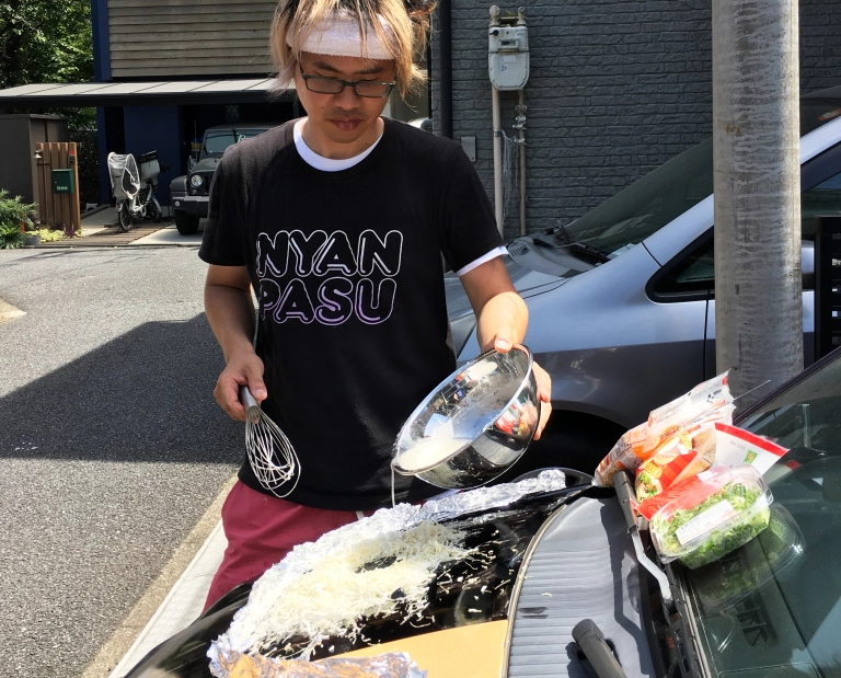 It’s so hot in Japan that people are cooking food in/on their cars ...