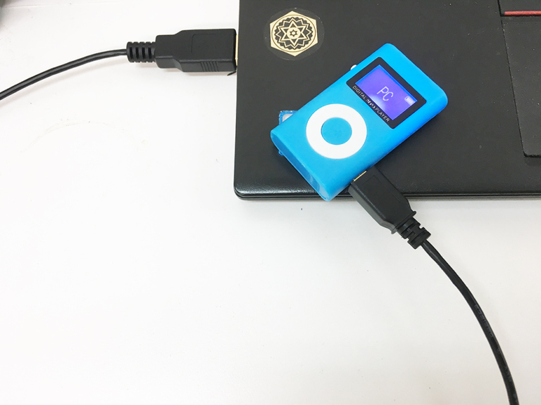 We take a 100-yen MP3 player for a test drive, live to tell the tale ...