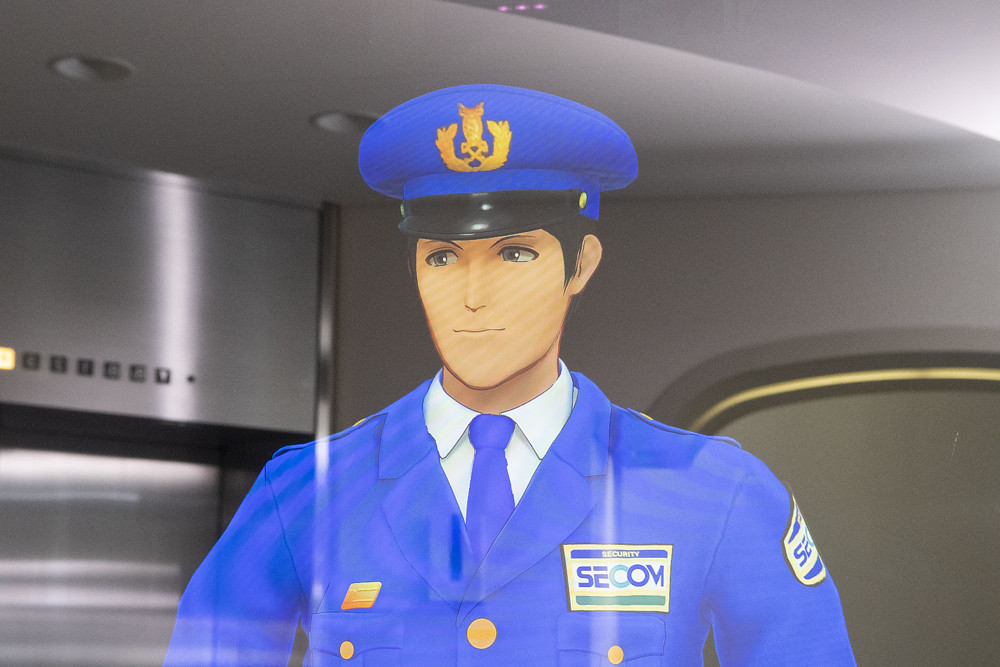 This handsome anime-style security guard will be protecting actual ...