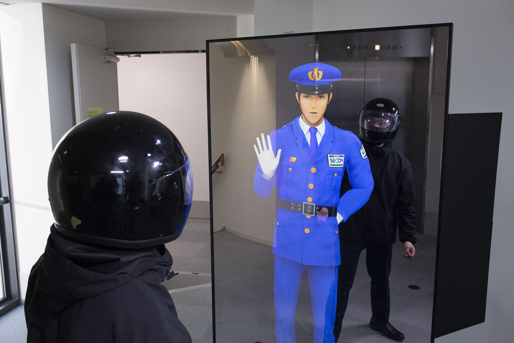 This handsome anime-style security guard will be protecting actual ...