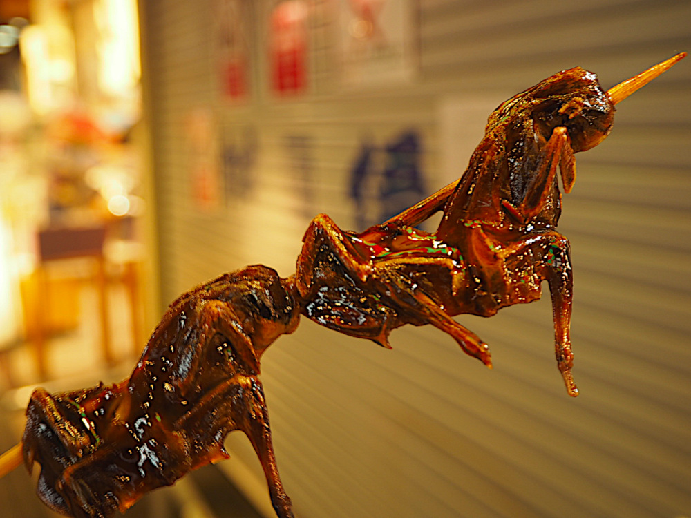 You can buy, and eat, a grilled sparrow on the streets of Kyoto, so we ...