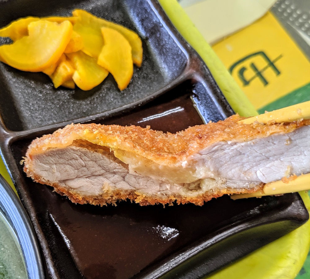 Japanese restaurant serves meals to diners via a moving steam ...