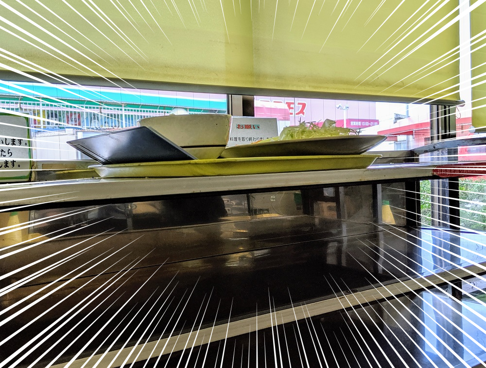 Japanese restaurant serves meals to diners via a moving steam ...