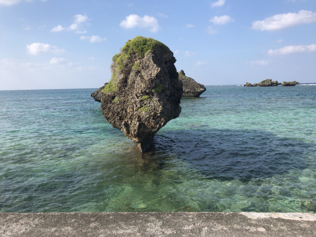 We visit the “Island of the Great Gods” in Okinawa, soak in ...