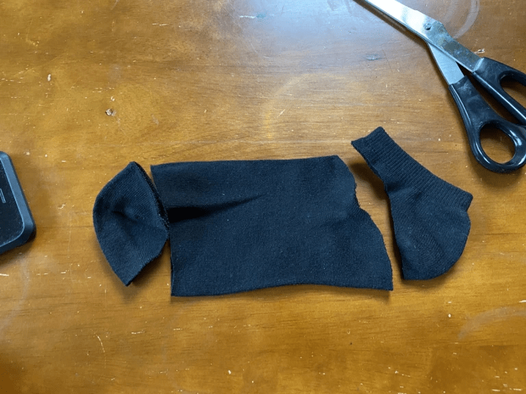 How to make a mask out of a sock in two minutes with no sewing skills ...