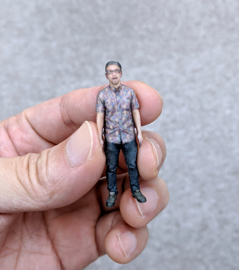 Mr. Sato got a tiny figure of himself made and put in the Evangelion ...