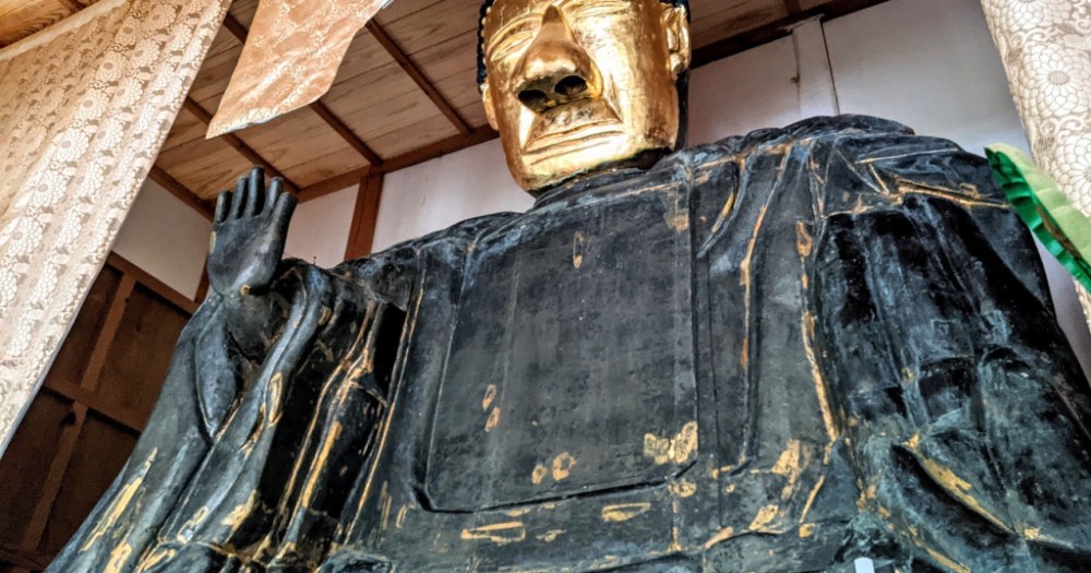 We visit the Giant Buddha statue that our reporter dubs “kawaii” and ...