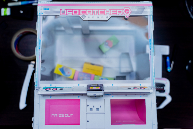 Sega creates mini UFO catcher crane game with electric arm for Japanese ...