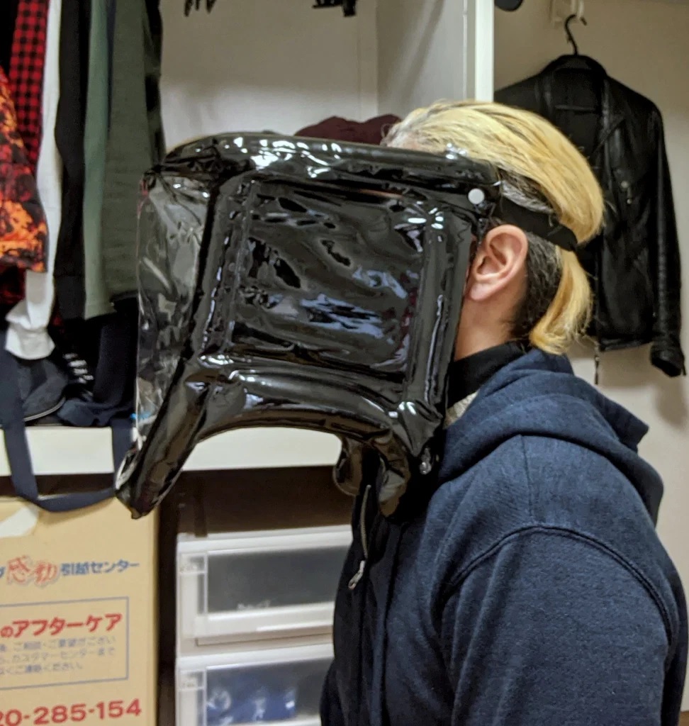 Japan’s crazy Air Shield face shield gets strapped to Mr. Sato’s head ...