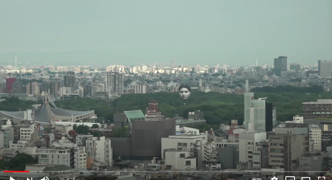 Giant floating head appears in the sky above downtown Tokyo【Video ...