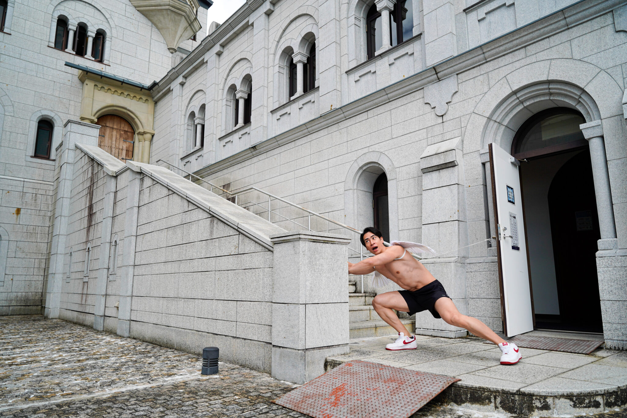 Japanese macho man stock photo site adds epic battle scene between buff ...