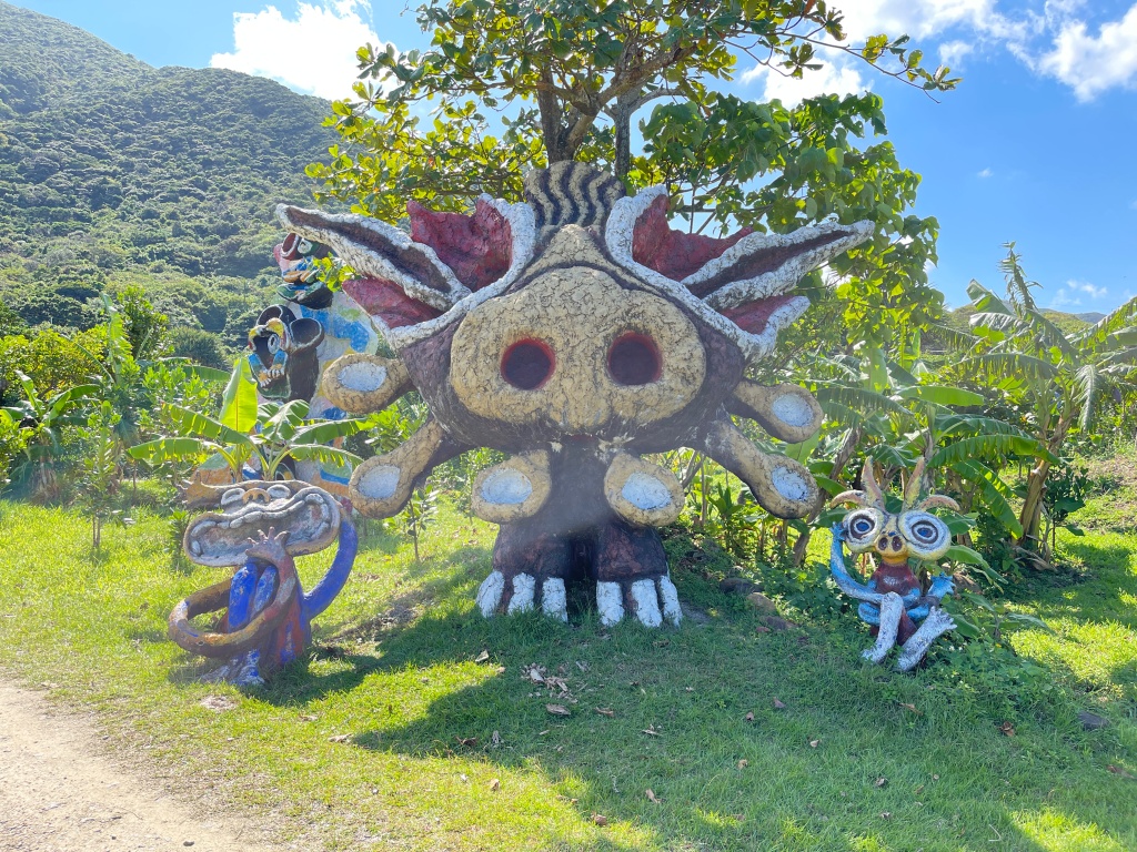 We soak in the island scenery and so many shisa statues at this ...