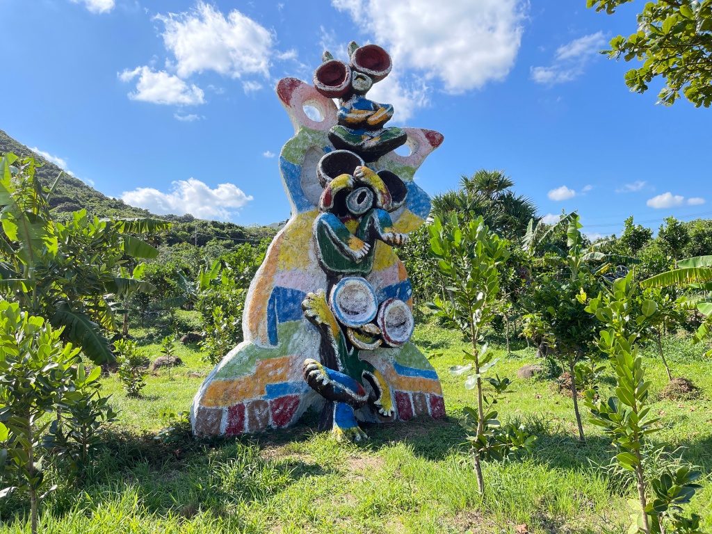 We soak in the island scenery and so many shisa statues at this ...