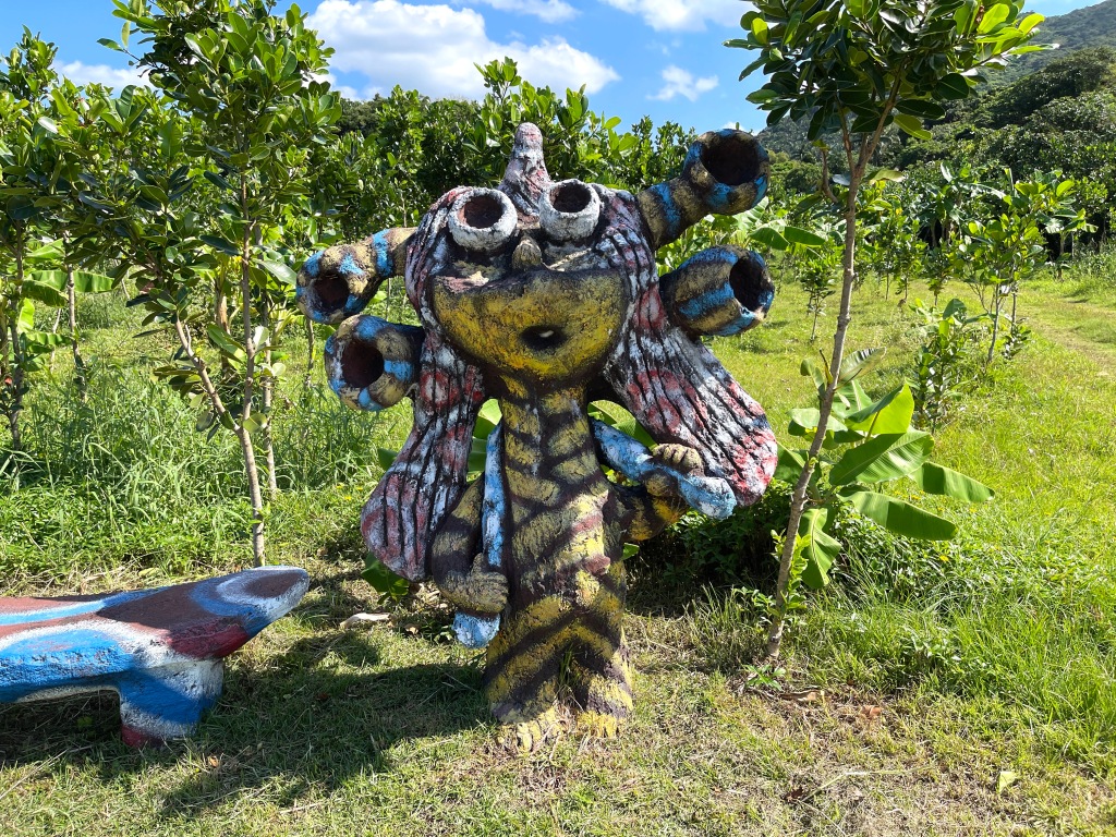 We soak in the island scenery and so many shisa statues at this ...