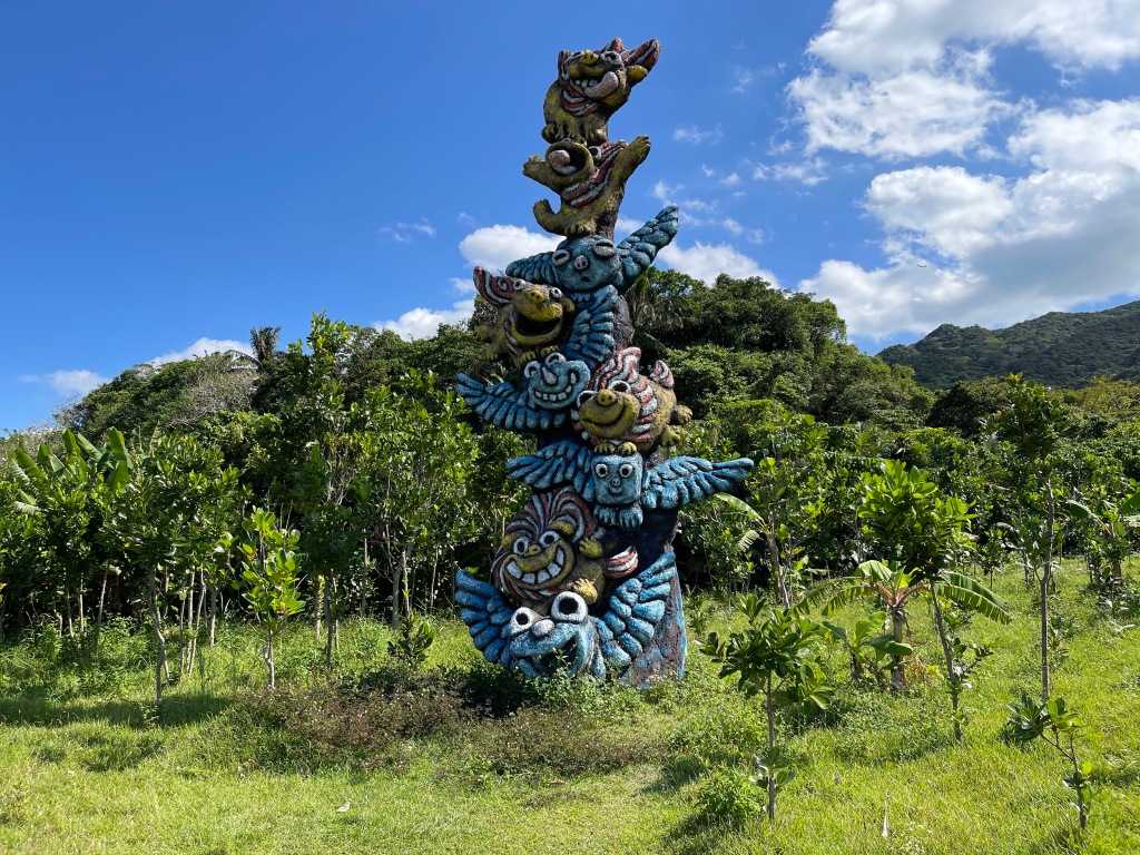 We soak in the island scenery and so many shisa statues at this ...