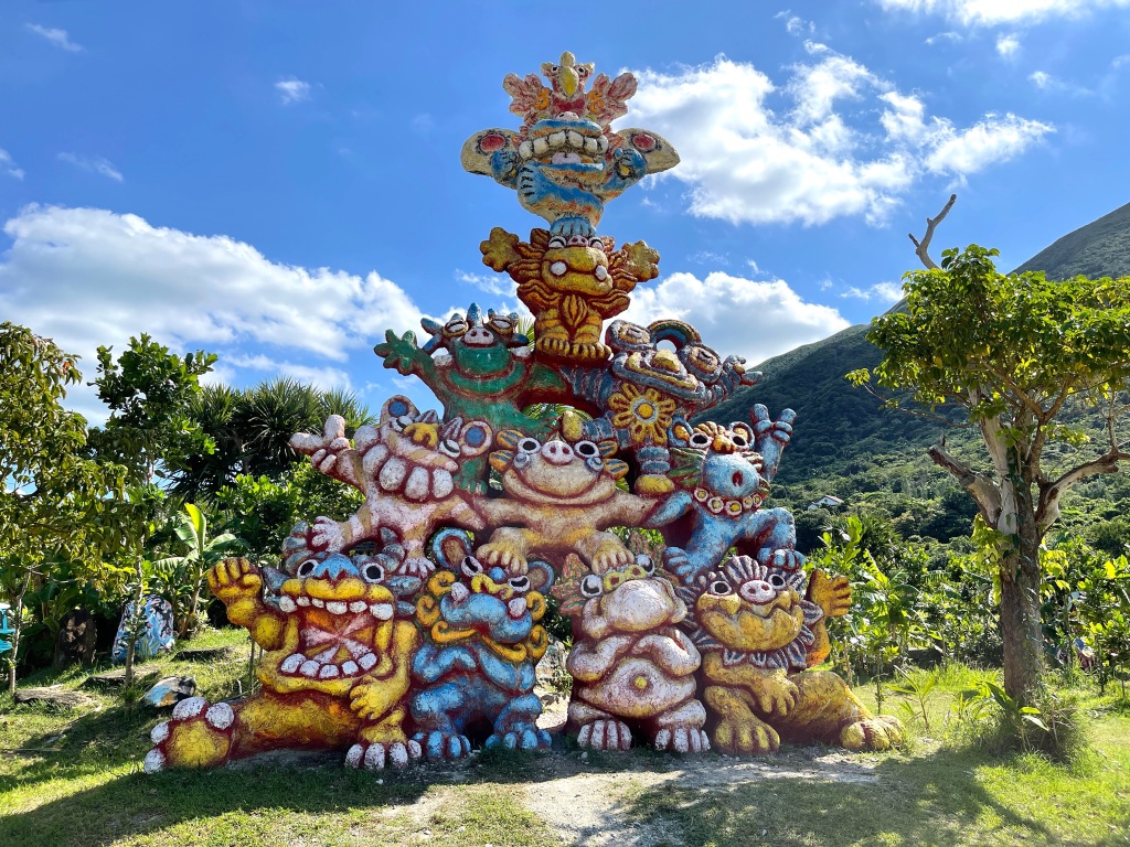 We soak in the island scenery and so many shisa statues at this ...