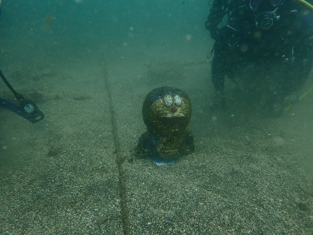 Doraemon found buried at sea as scene from 1993 anime becomes real life ...