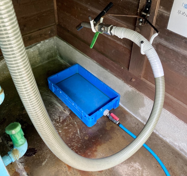 Japanese onsen stand is part gas station, part hot spring vending ...