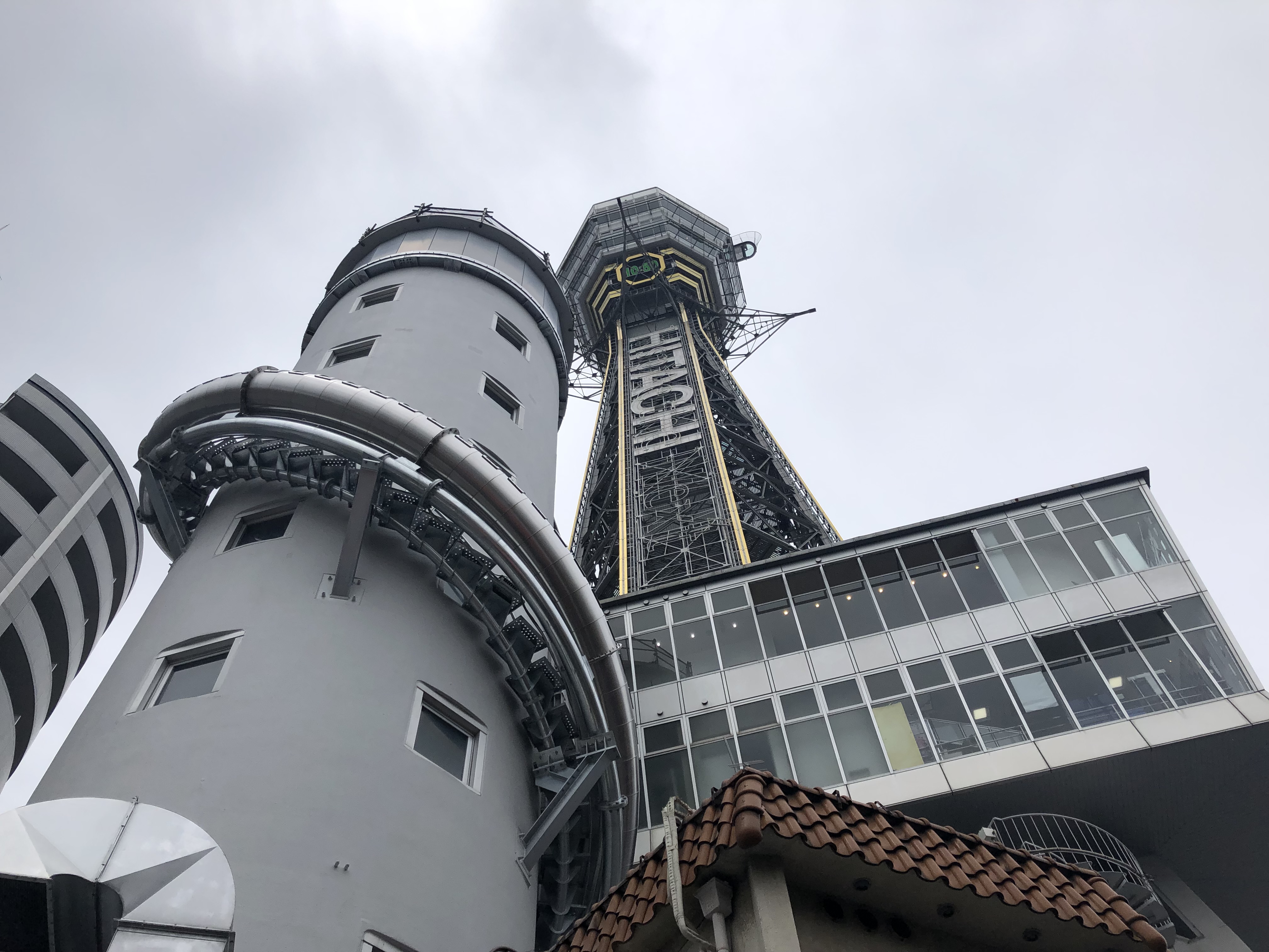 We slide down Osaka’s most famous tower and get free curry for it ...