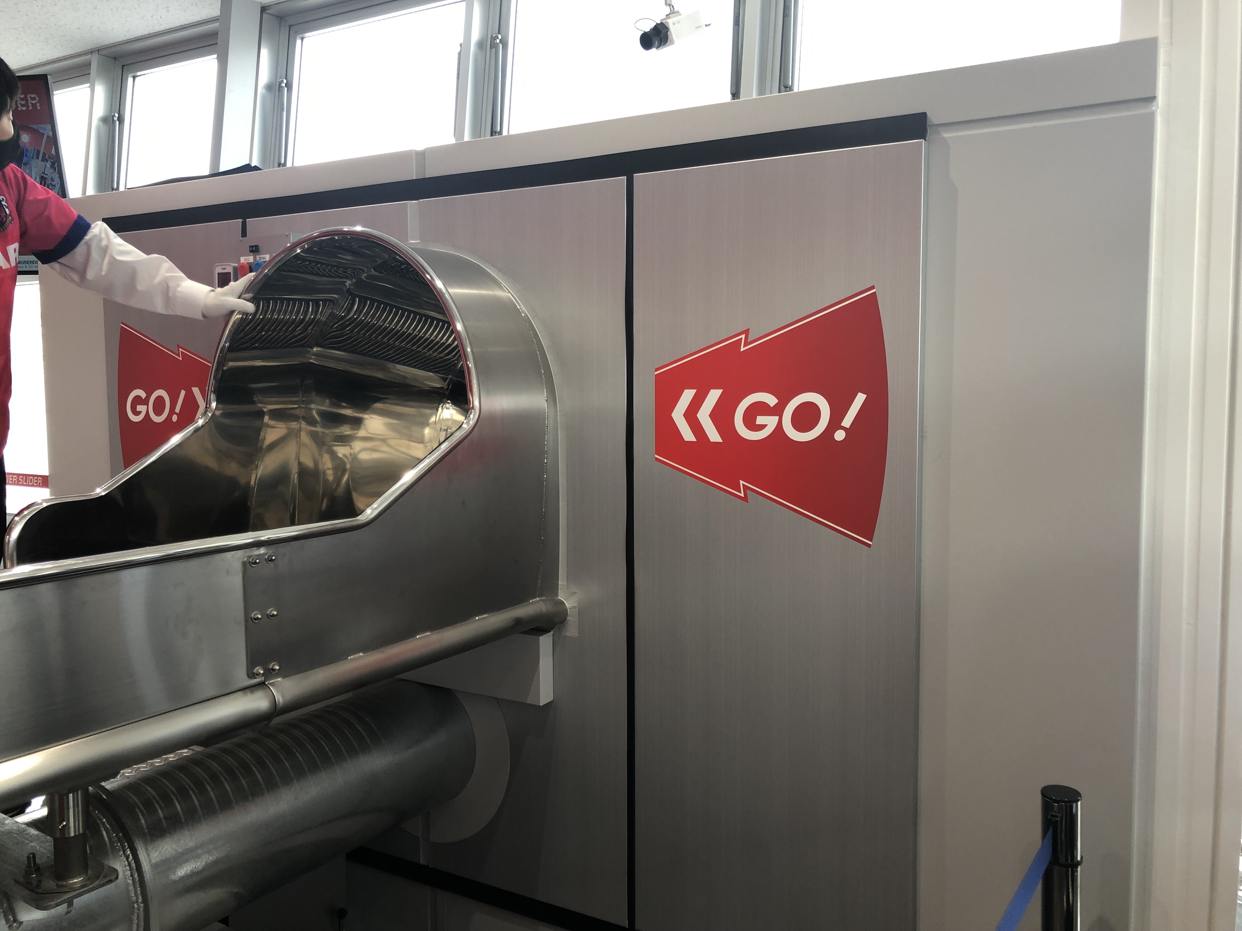 We slide down Osaka’s most famous tower and get free curry for it ...