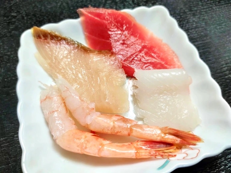 This plastic wrap is supposed to turn supermarket sashimi into great ...