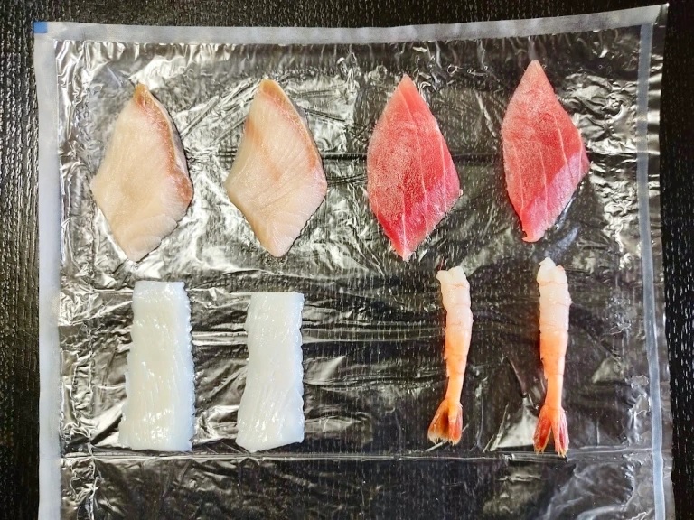 This plastic wrap is supposed to turn supermarket sashimi into great ...