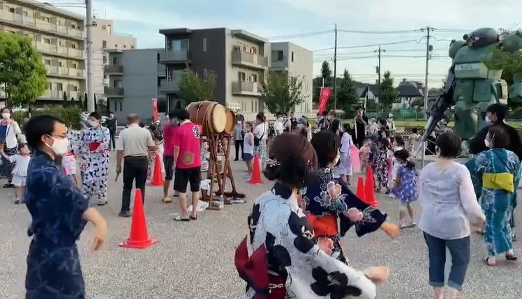 And now, a traditional Japanese bon dance, performed next to a life ...