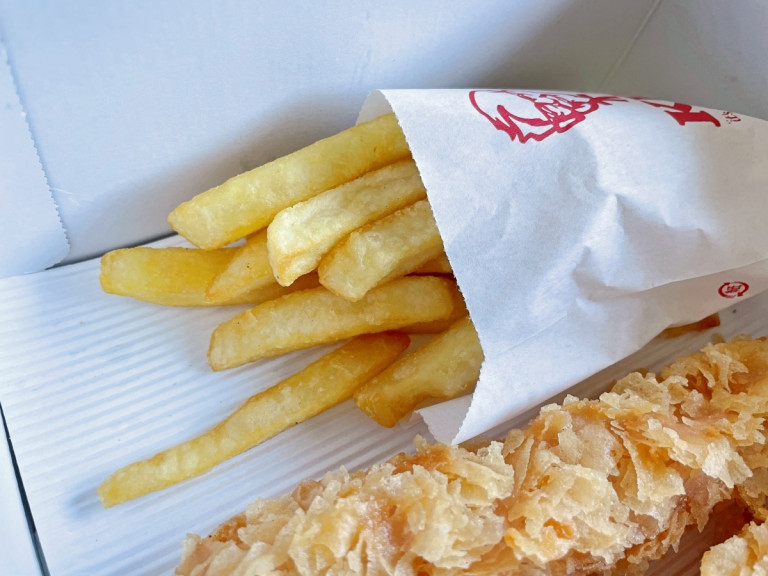 We buy Kentucky Fried Chicken’s box of New Year’s food, but it comes ...