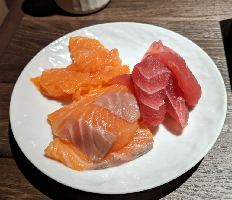 We eat a luxurious Japanese-style buffet breakfast in a restaurant full ...