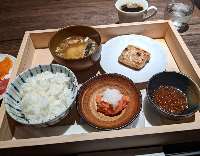 We eat a luxurious Japanese-style buffet breakfast in a restaurant full ...