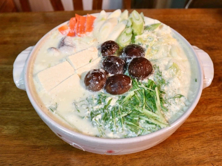 Apparently Calpis is good in soup? We try mixing it in with hot pot ...