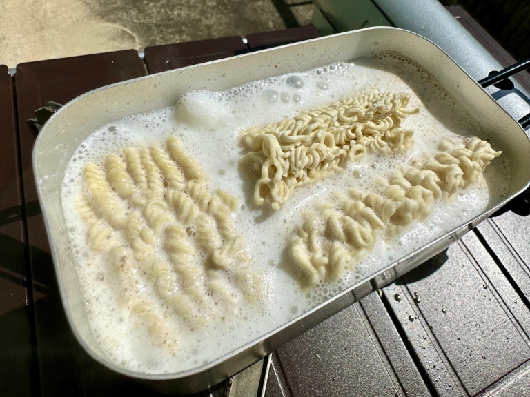 We try an easy, cheesy, Italian-inspired camp meal using instant ...