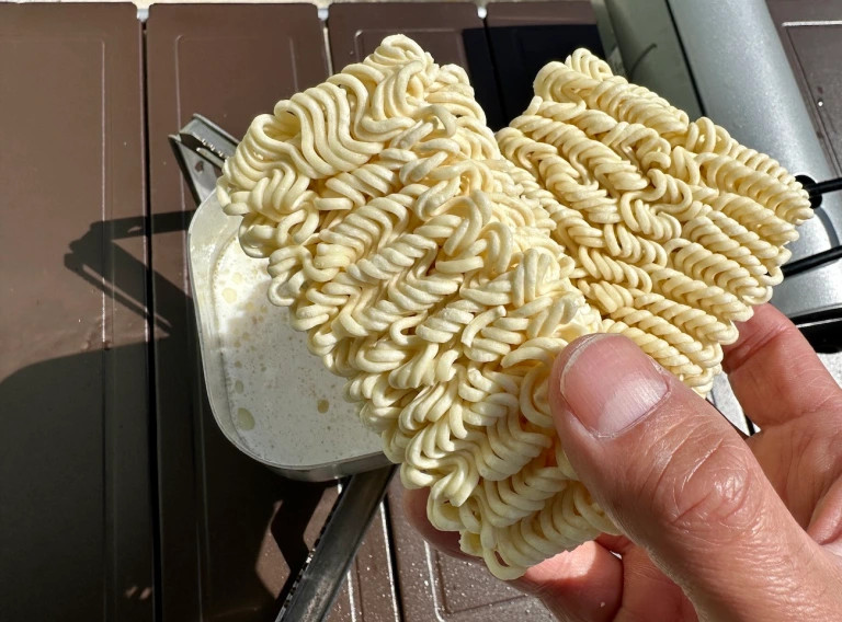 We try an easy, cheesy, Italian-inspired camp meal using instant ...