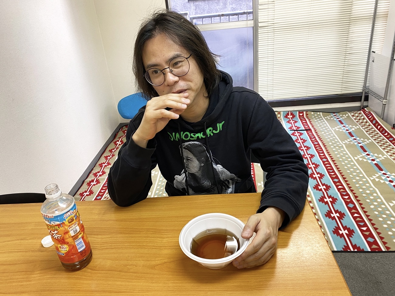 We try a half-drunk bottle of tea that’s been sitting on the balcony ...