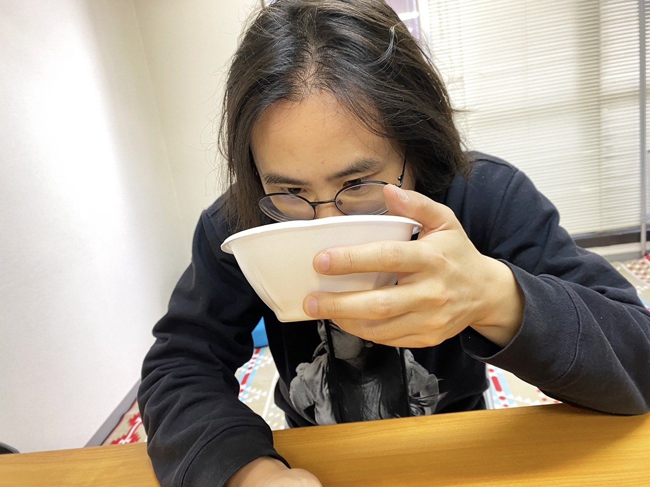 We try a half-drunk bottle of tea that’s been sitting on the balcony ...